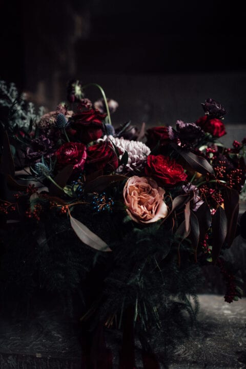 Dark, moody gothic wedding bouquet ideas, including flower guide